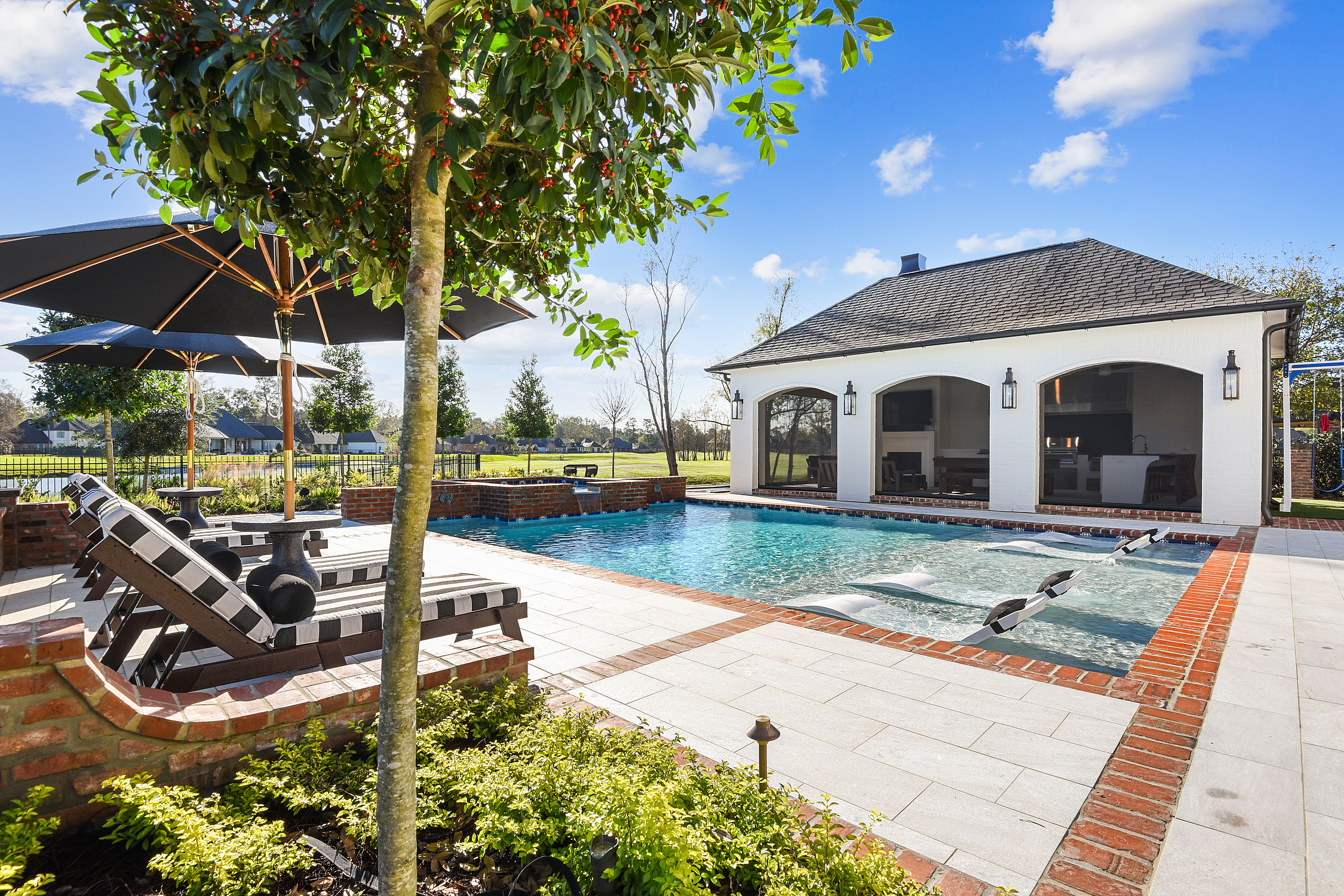 Pool with Outdoor Kitchen in Baton Rouge | Custom Pools Denham Springs